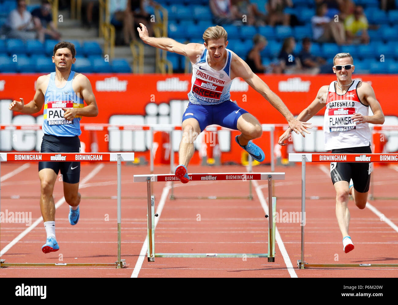 Great Britain's Jack Green (centre) hits the final hurdle during the ...