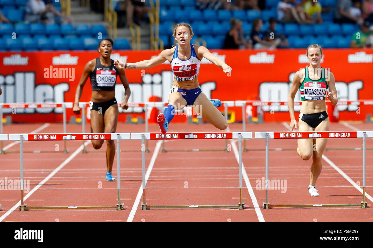 Great Britain's Meghan Beesley (centre) jumps the final hurdle on the ...