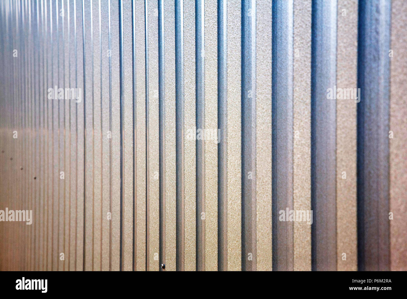 metal wall image going off into the distance Stock Photo - Alamy