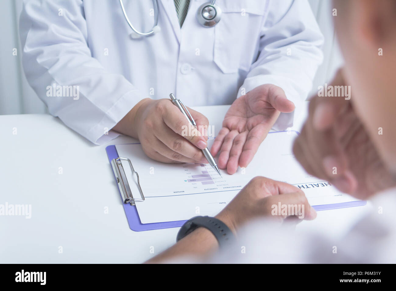 Doctor and patient are discussing something.- Health care concept Stock ...