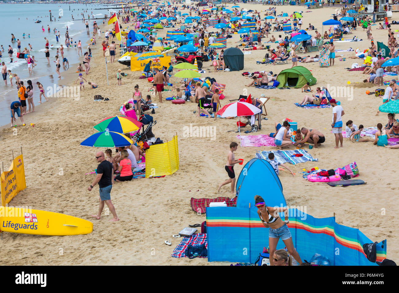 Bournemouth, Dorset, UK. 1st July 2018. UK weather: hazy sunshine, but ...