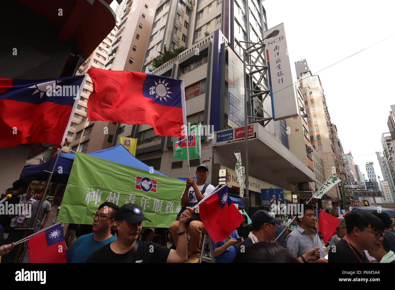 Hong Kong, CHINA. 1st July, 2018. Pro-Republic of China demonstrators ...