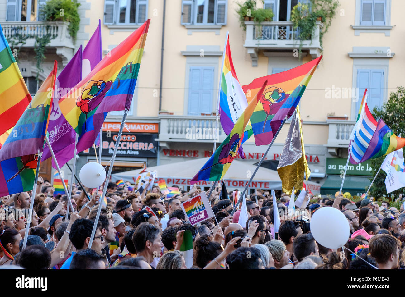 Milan, Italy. 30th Jun, 2018. Crowd of people holding flags and ...