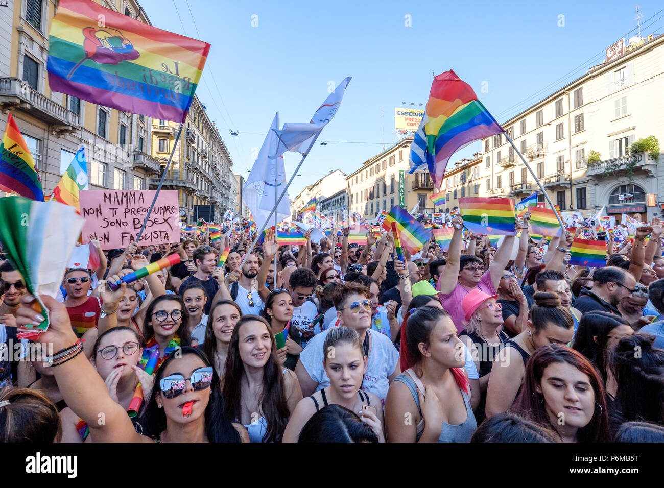 Milan, Italy. 30th Jun, 2018. Crowd of people holding rainbow flags and ...