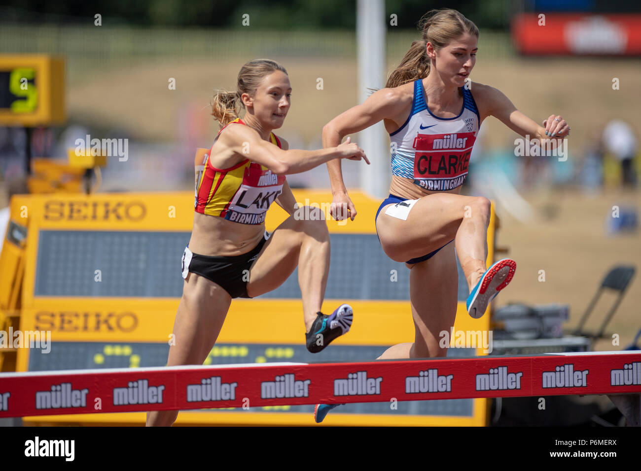 Birmingham, UK. 1st July, 2018. Race winner Rosie Clarke (right) and ...
