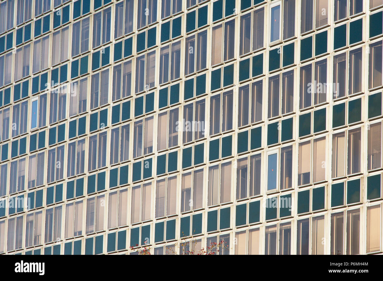 Architecture detail, windows of an office building in a repetitive ...