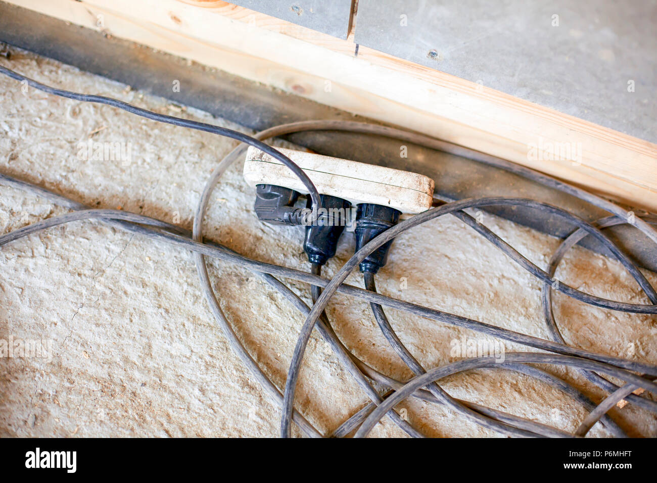 Dirty surge protector with electric power cables Stock Photo - Alamy