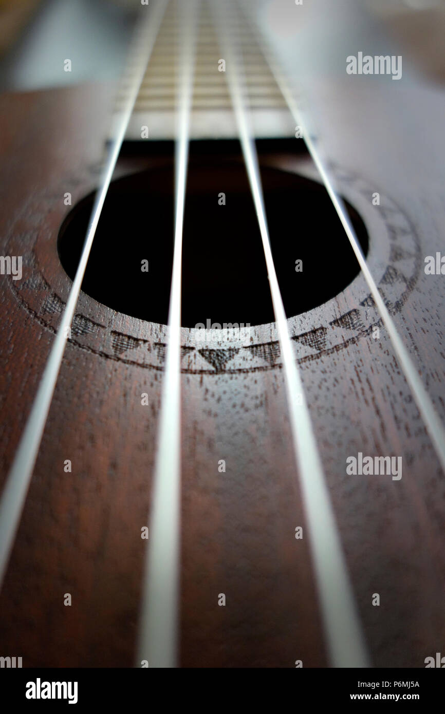 Close up of Ukelele Strings and Sound hole Stock Photo - Alamy