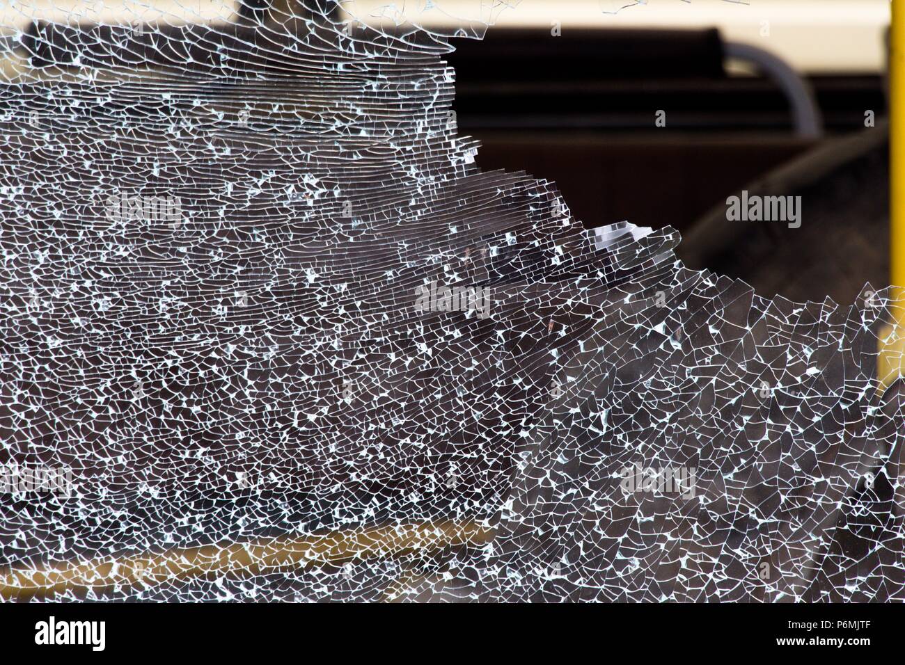 Broken side window in the vehicle. After the glass was broken, it ...