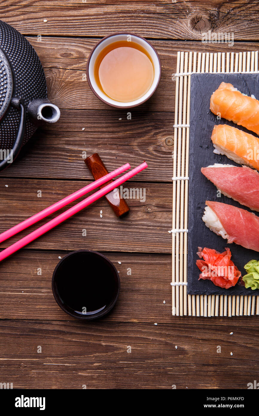 Photo of sushi, red sticks Stock Photo - Alamy