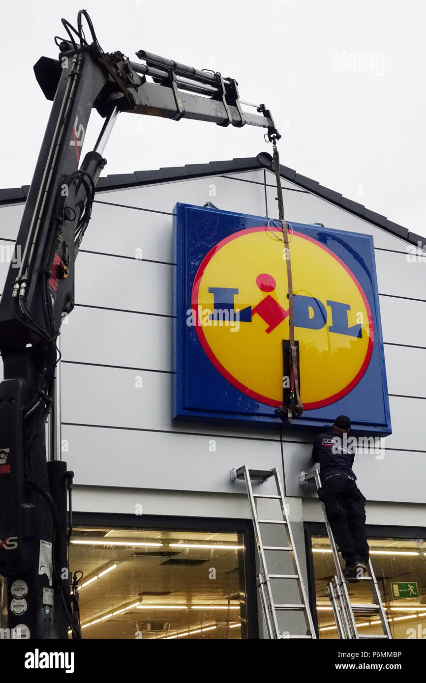 Berlin, Germany, company sign of the discounter Lidl is mounted on the ...