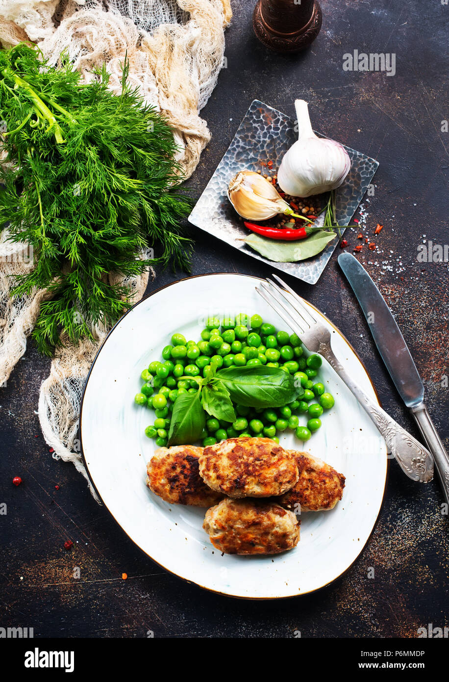 fried cutlets with green pea, cutlets with pea Stock Photo - Alamy