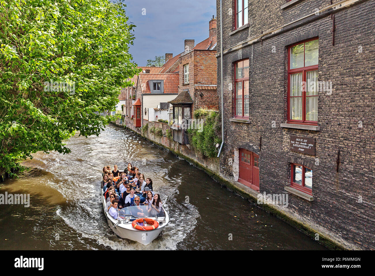 BRUGES, BELGIUM - JUNE 8, 2017: Group of tourists at an excursion on ...
