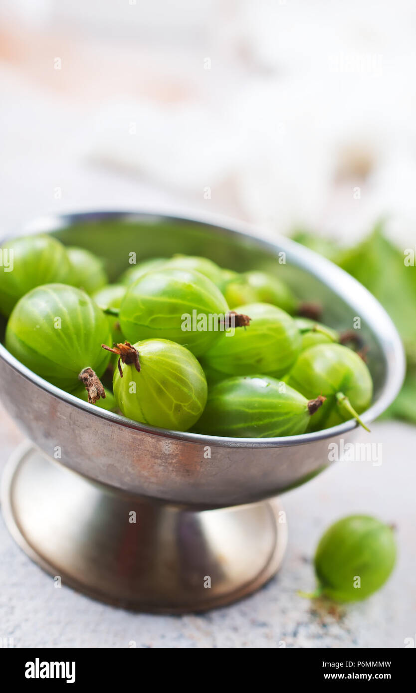Gooseberry in metal bowl hi-res stock photography and images - Alamy