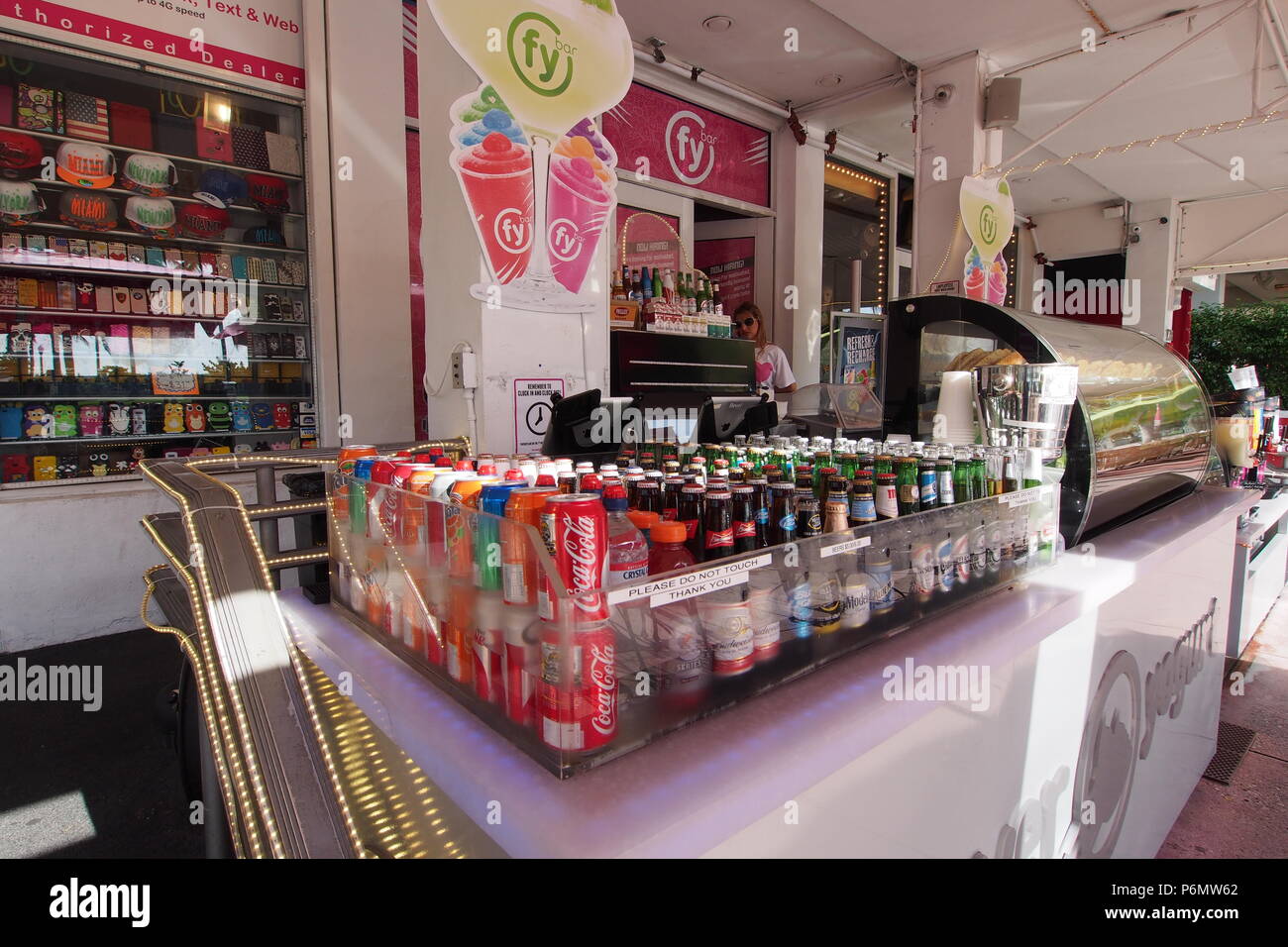 Sidewalk stall selling sodas, beer, pastries, etc. on Ocean Drive in ...