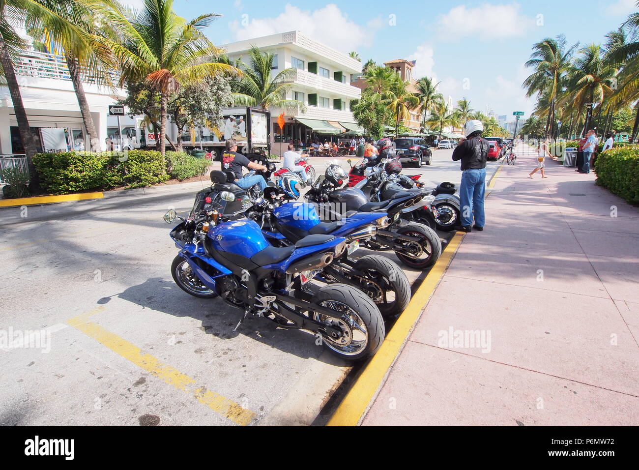 Street scene of parked motorcycles and art deco buildings on Ocean ...