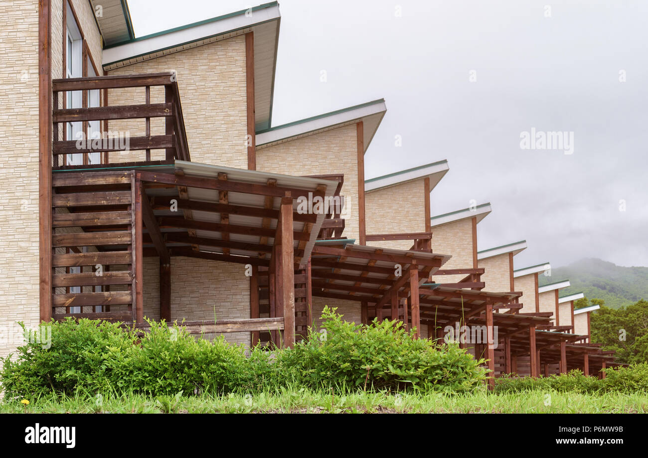 Beach houses for rest. Houses on the beach Stock Photo - Alamy