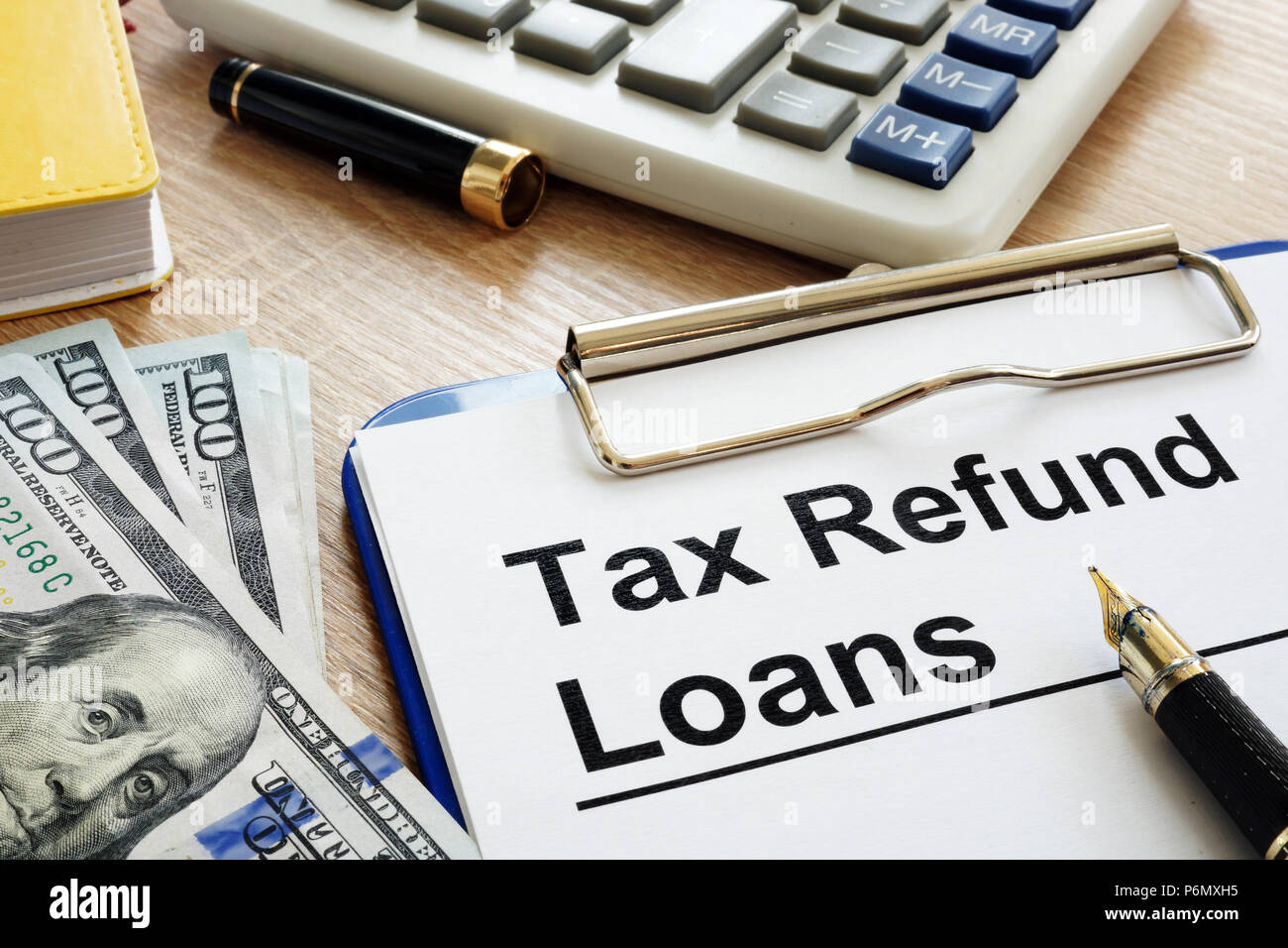Tax Refund Loans application form on a desk Stock Photo - Alamy