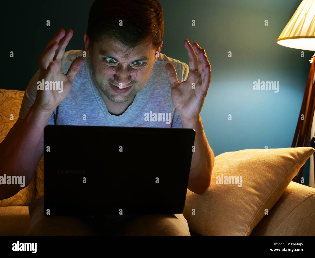 Angry man at computer hi-res stock photography and images - Alamy