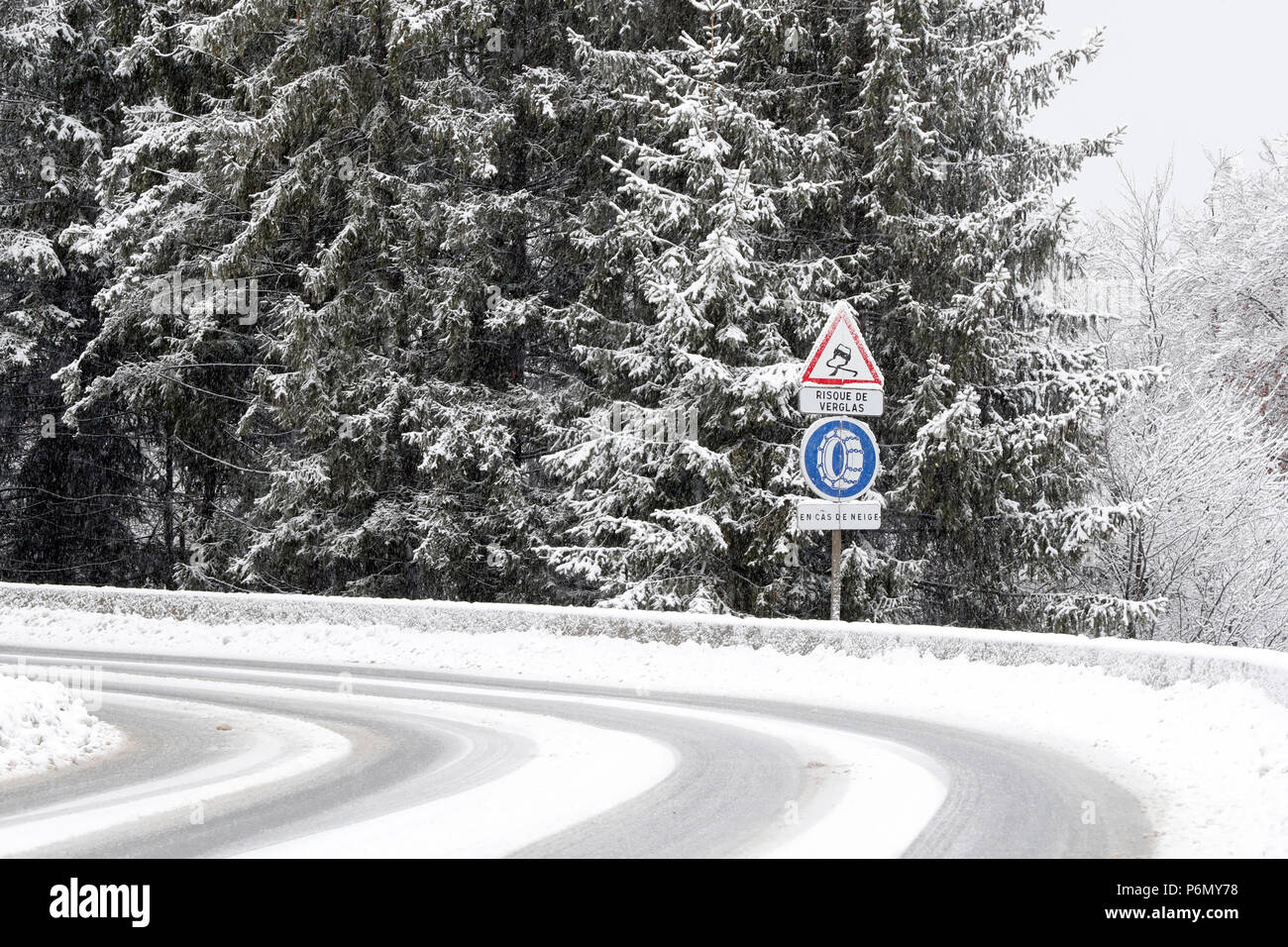 Mountain road in winter. Road signs. Saint-Gervais. France Stock Photo ...