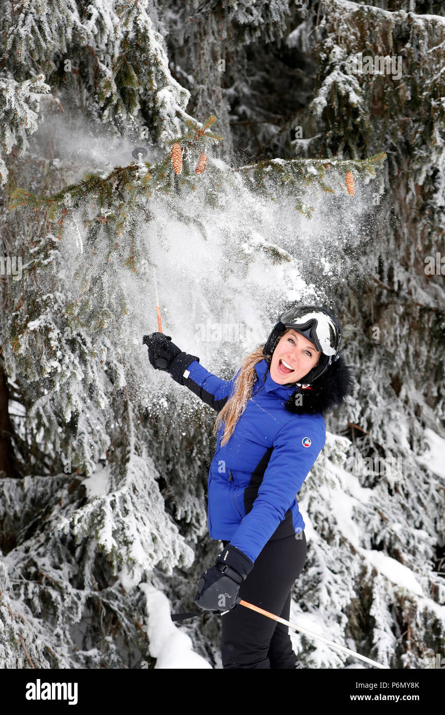 French Alps. Mont-Blanc massif. Young woman skier at ski resort in ...