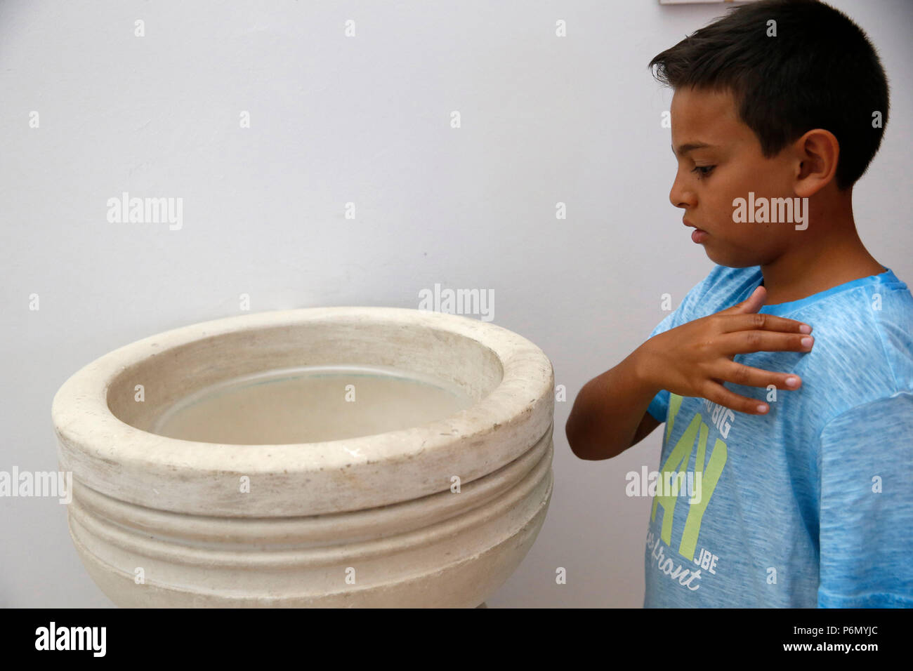 Catholic making cross sign hi-res stock photography and images - Alamy