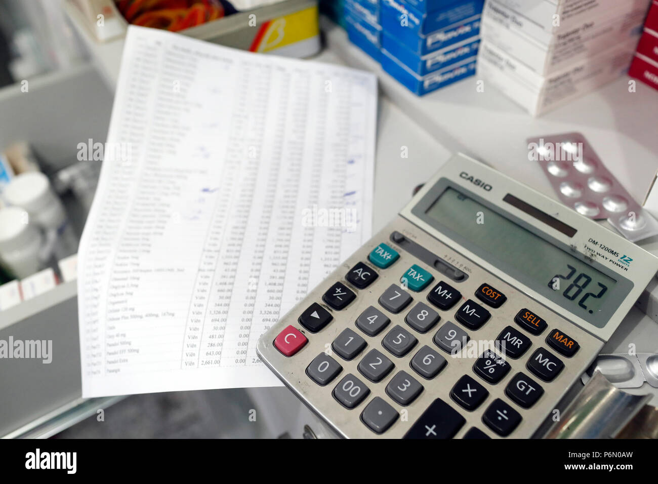 Hospital pharmacy. Calculator. Ho Chi Minh City. Vietnam Stock Photo ...