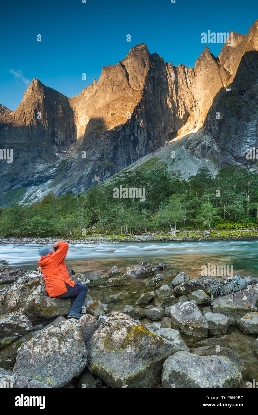 Outdoor photographer taking pictures of Trollveggen, or the Troll Wall ...