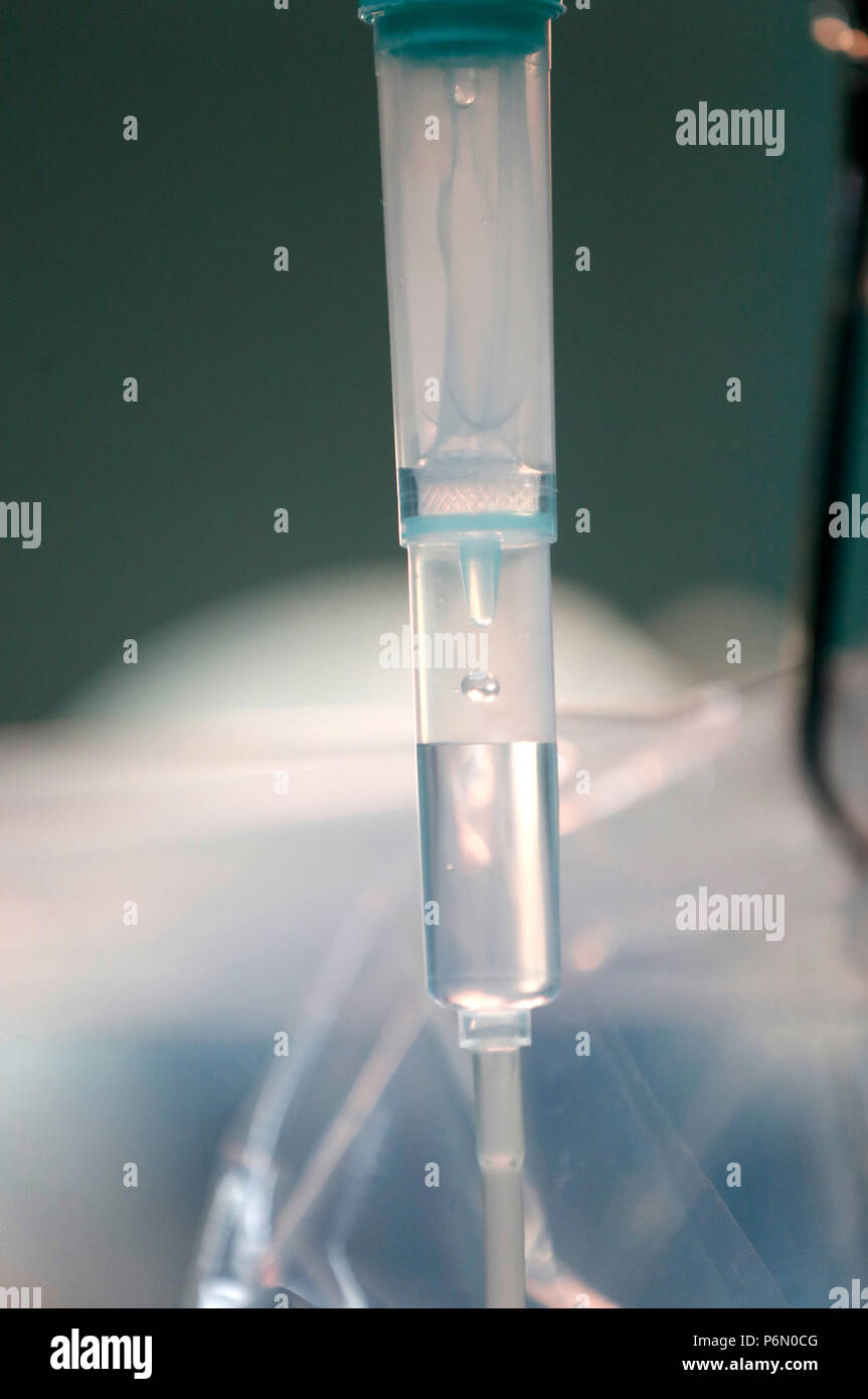 Close up intravenous drip chamber hi-res stock photography and images ...