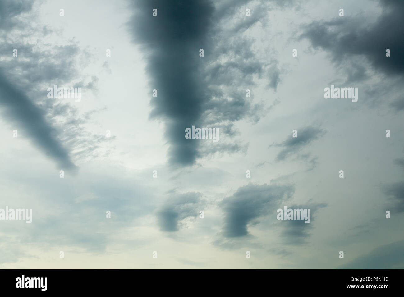 Dark ominous grey storm clouds. Dramatic sky. Nature background Stock ...