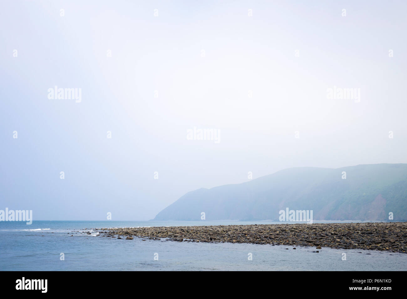 View from the rocky beach at Lynmouth north-east to Foreland Point ...