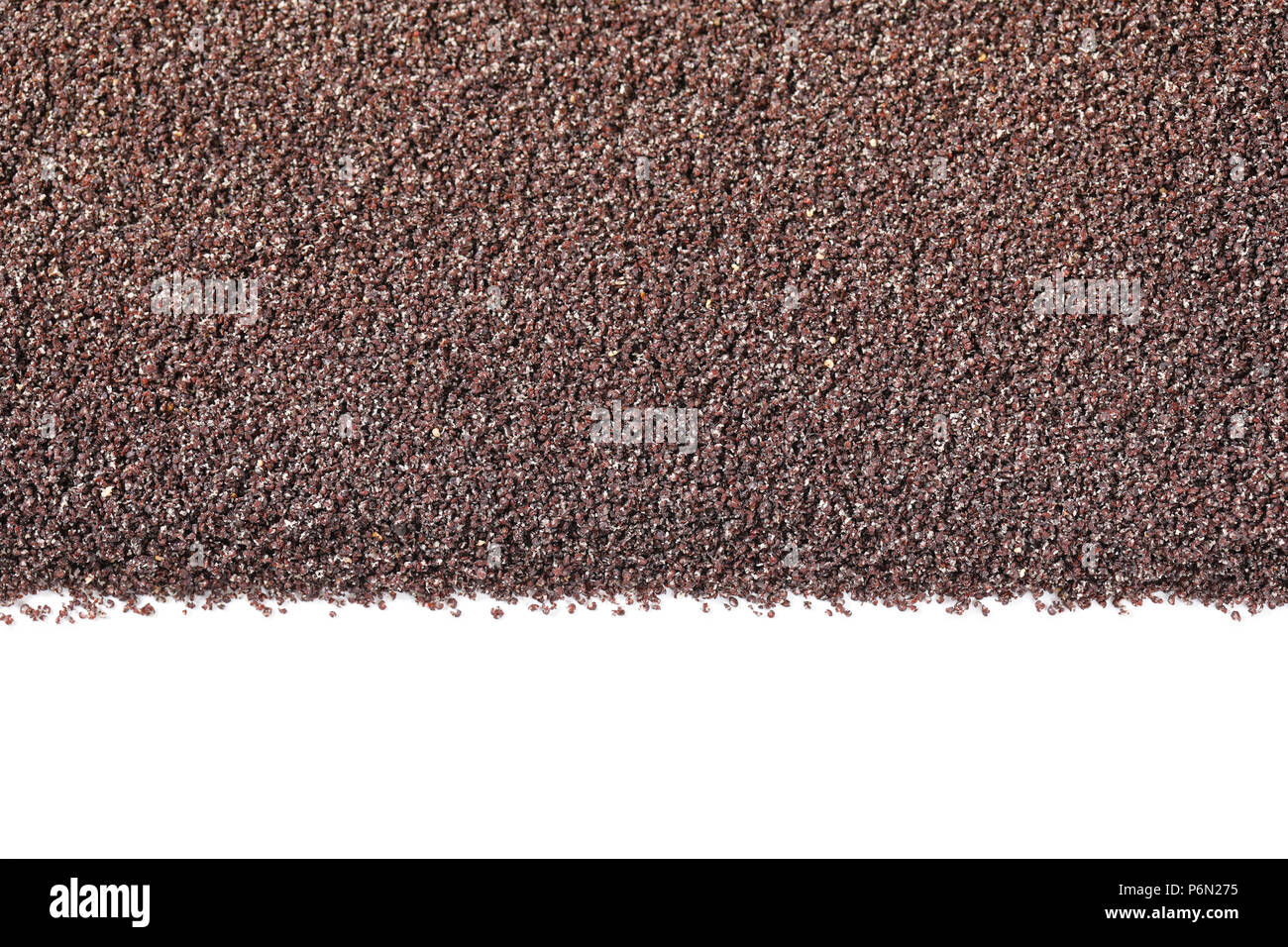 ground poppy seeds on white background Stock Photo - Alamy