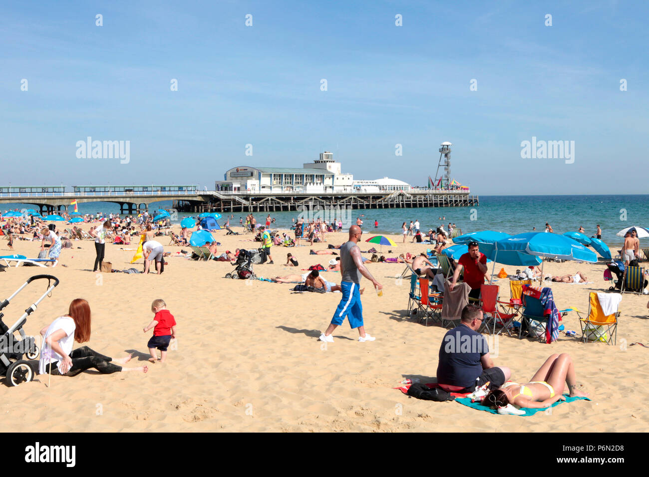 PEOPLE FLOCK TO THE BEACH IN BOURNEMOUTH IN THE LAST WEEK OF JUNE ...