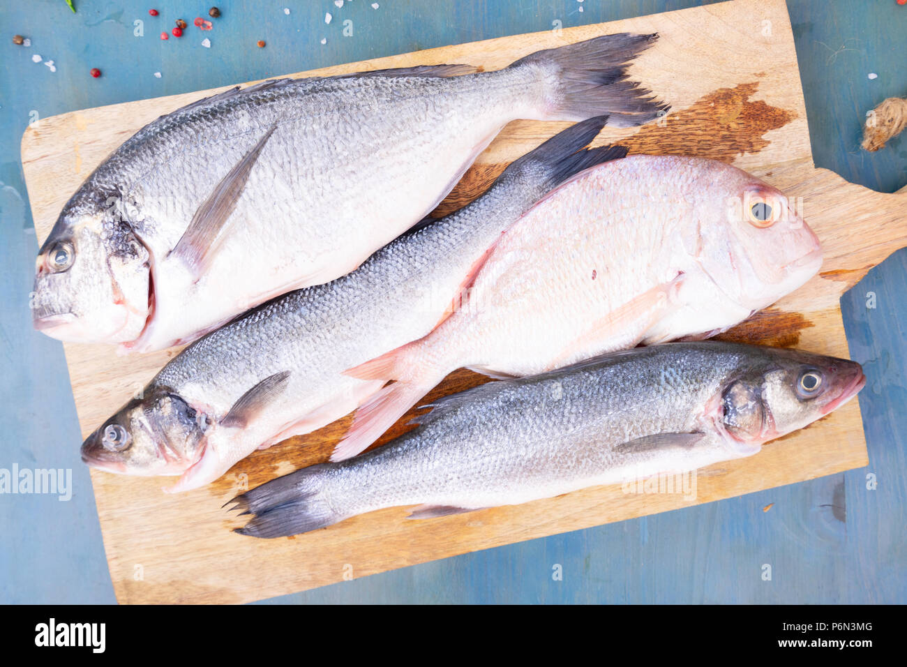 fresh sea fish preparation Stock Photo - Alamy