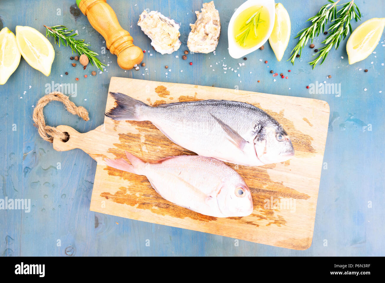 fresh sea fish preparation Stock Photo - Alamy