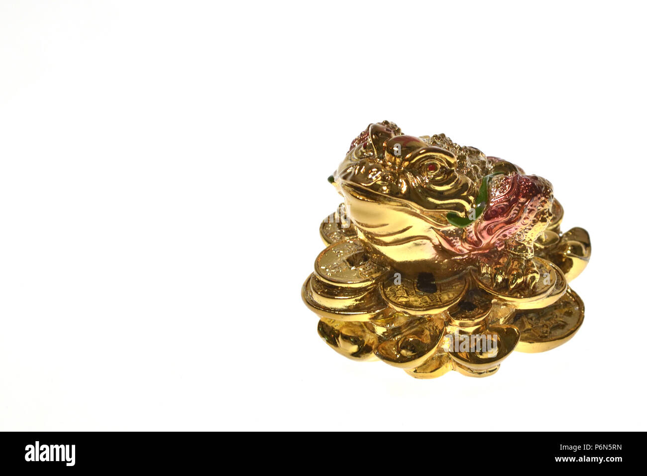 Chinese Feng Shui Frog with coins. Isolated on white Stock Photo - Alamy
