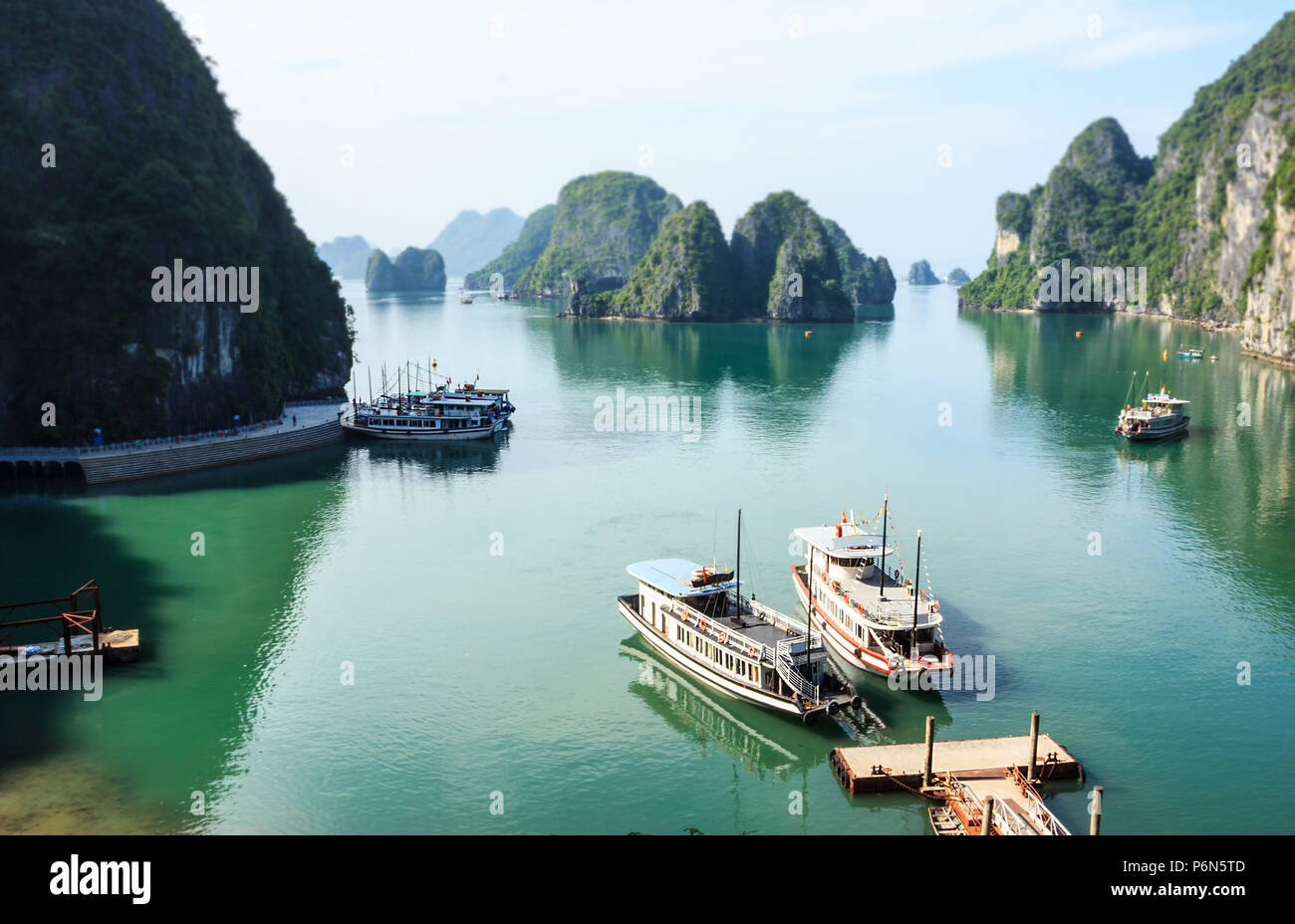 Panoramic view of Ha Long Bay islands, tourist boat and seascape from ...