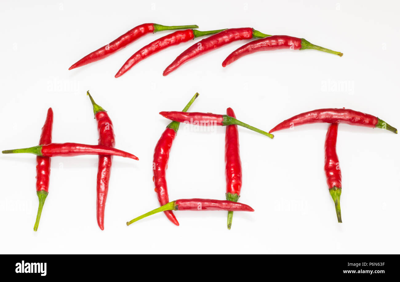 The word hot made from red chili peppers on a white background Stock ...