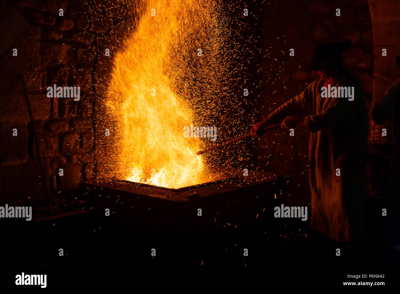 Smelting iron ancient hi-res stock photography and images - Alamy