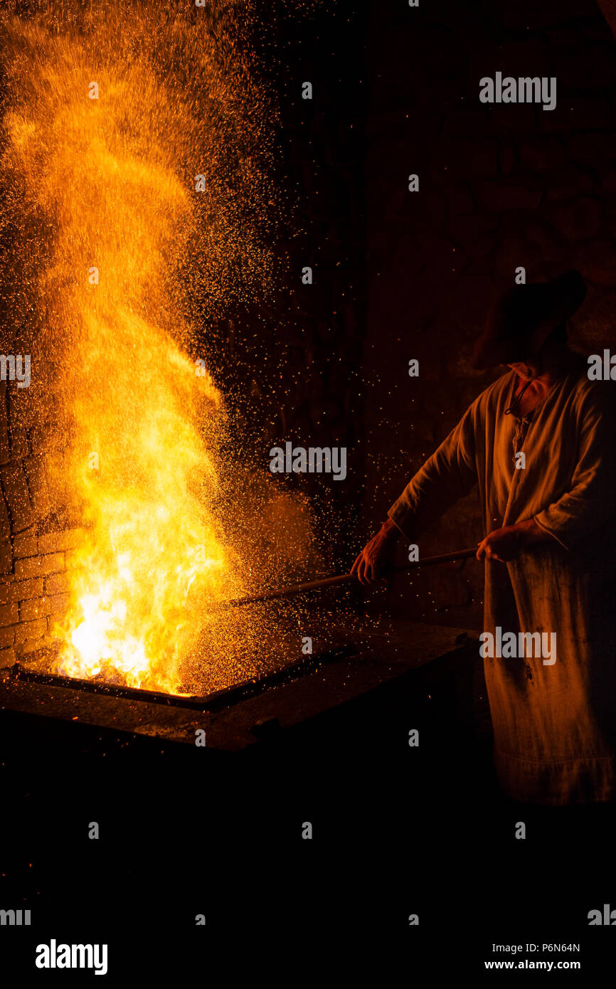 Smelting iron ancient hi-res stock photography and images - Alamy