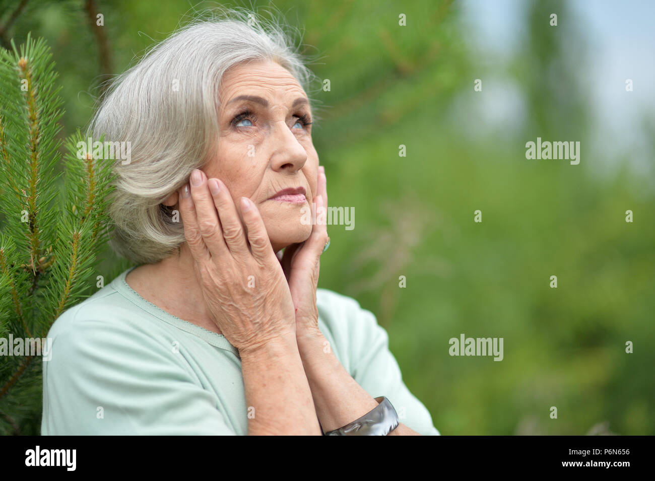 beautiful sad senior woman Stock Photo - Alamy