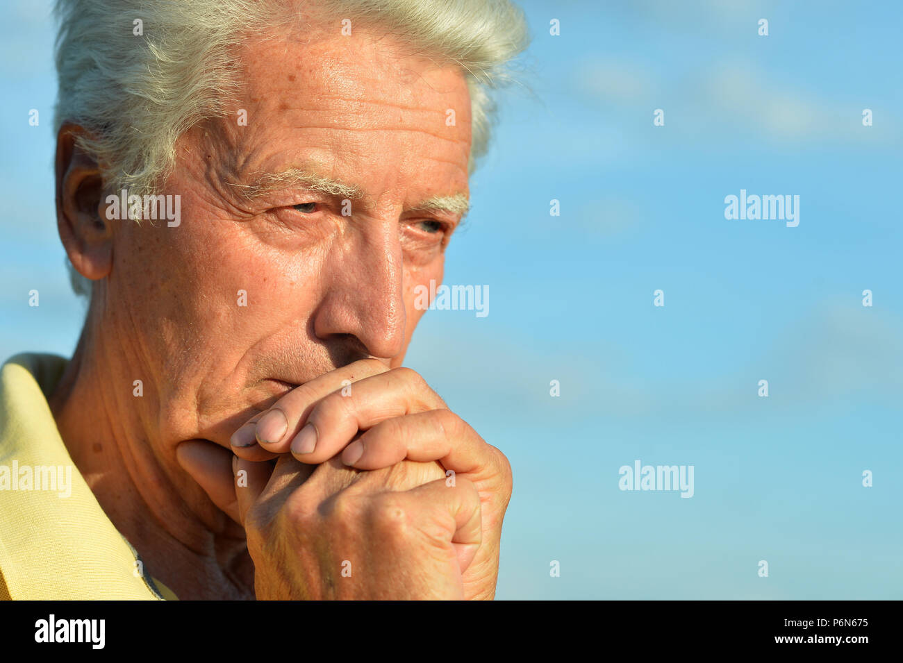 upset senior man Stock Photo - Alamy