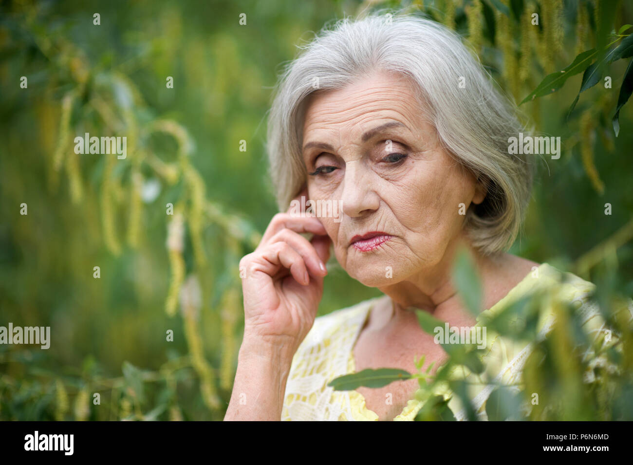 beautiful sad senior woman Stock Photo - Alamy