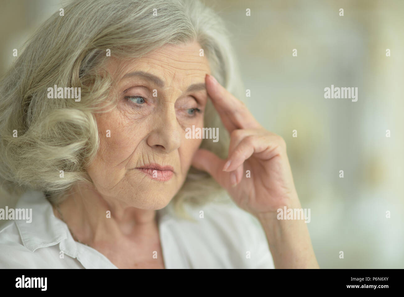 beautiful Sad senior woman Stock Photo - Alamy