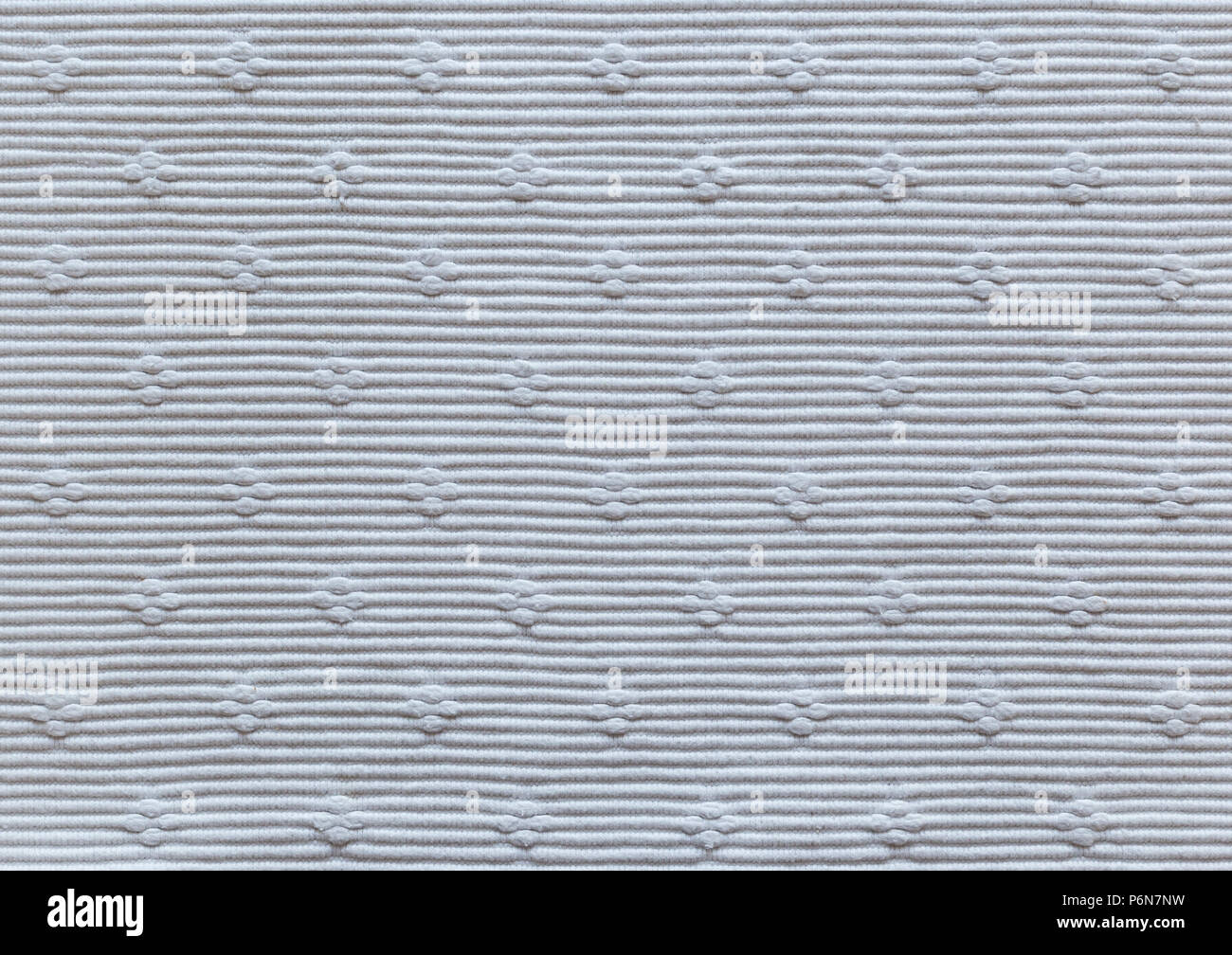 Full frame background of a seamless white tablecloth viewed from above ...