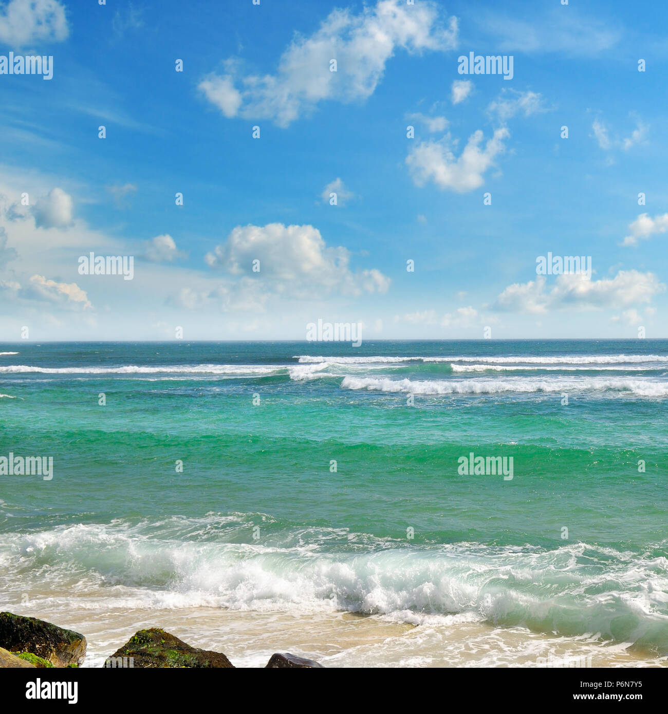 ocean, picturesque beach and blue sky Stock Photo - Alamy