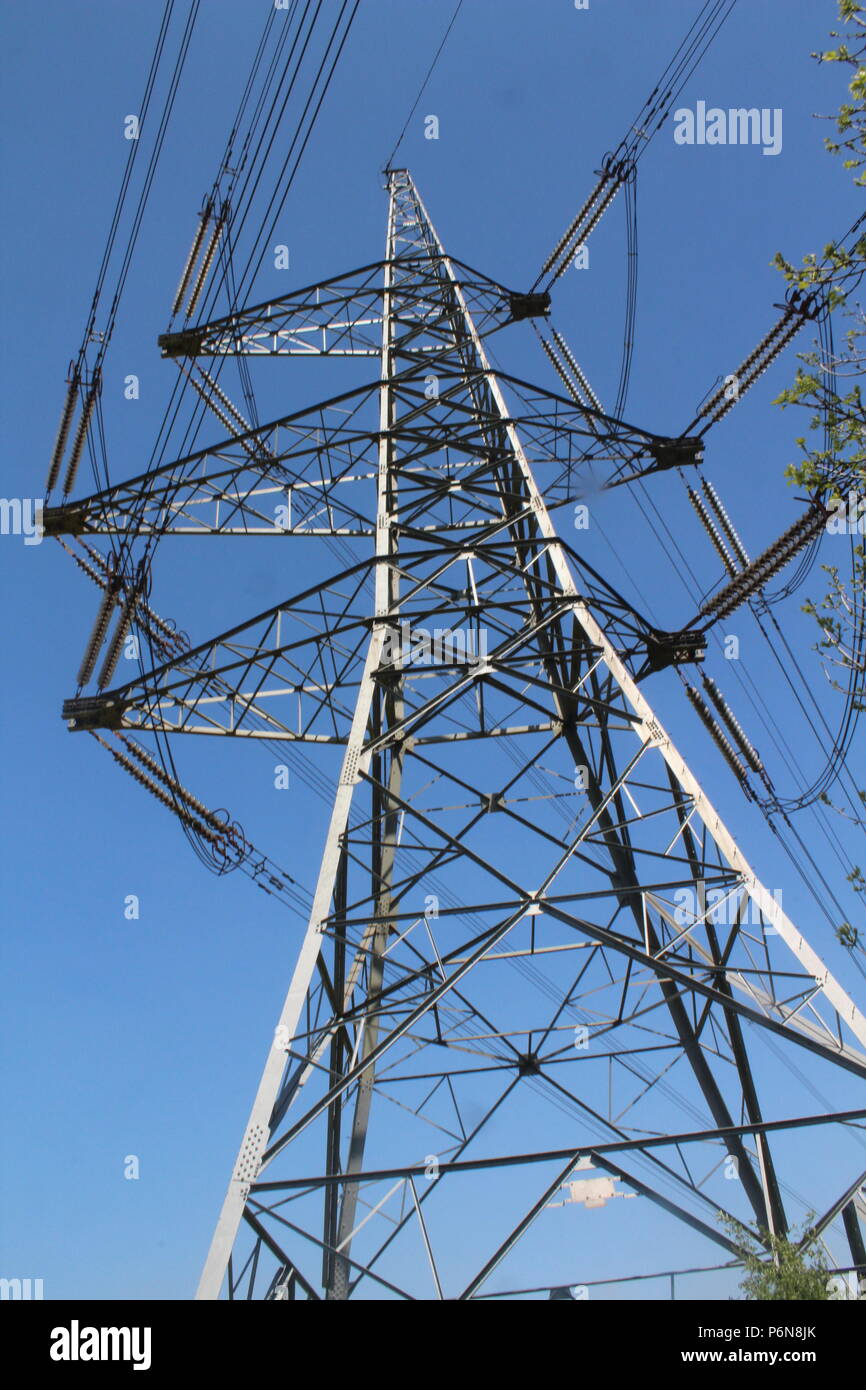 High voltage electricity pylons in Yorkshire field Stock Photo - Alamy