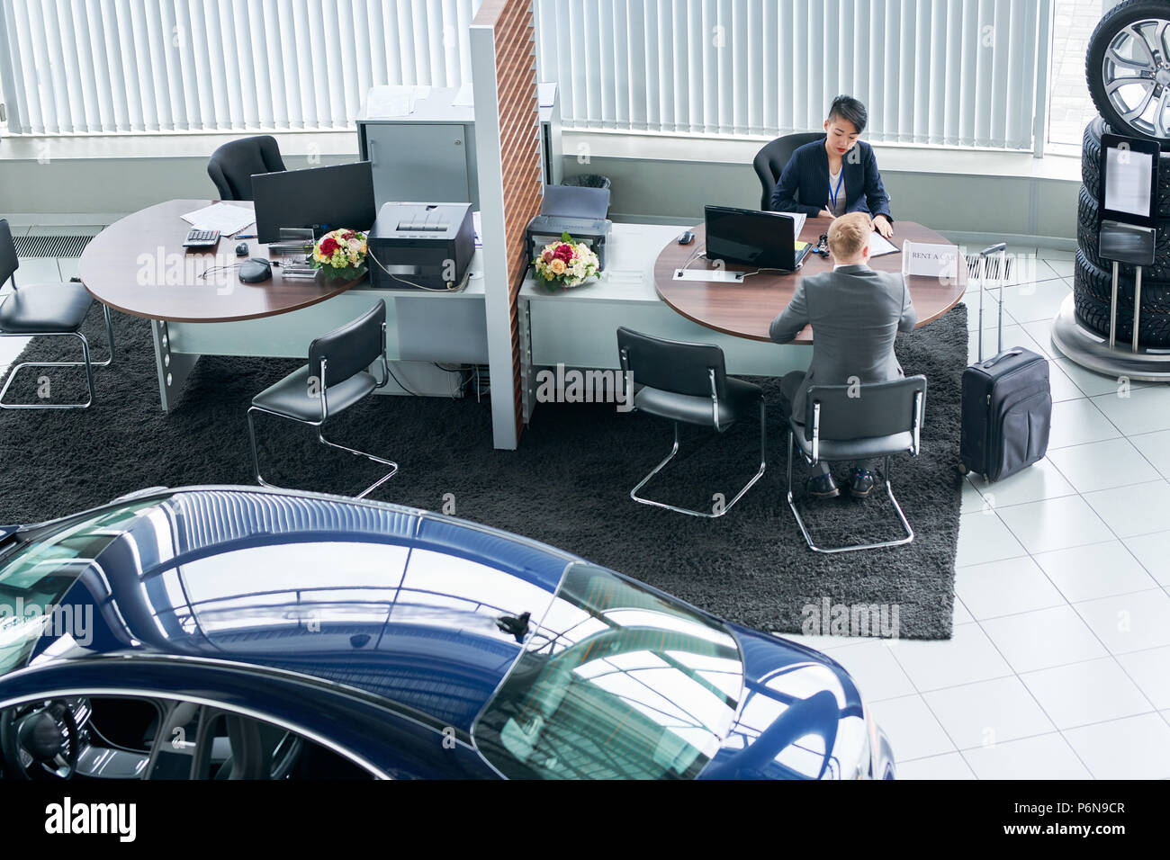 Man renting a car Stock Photo - Alamy