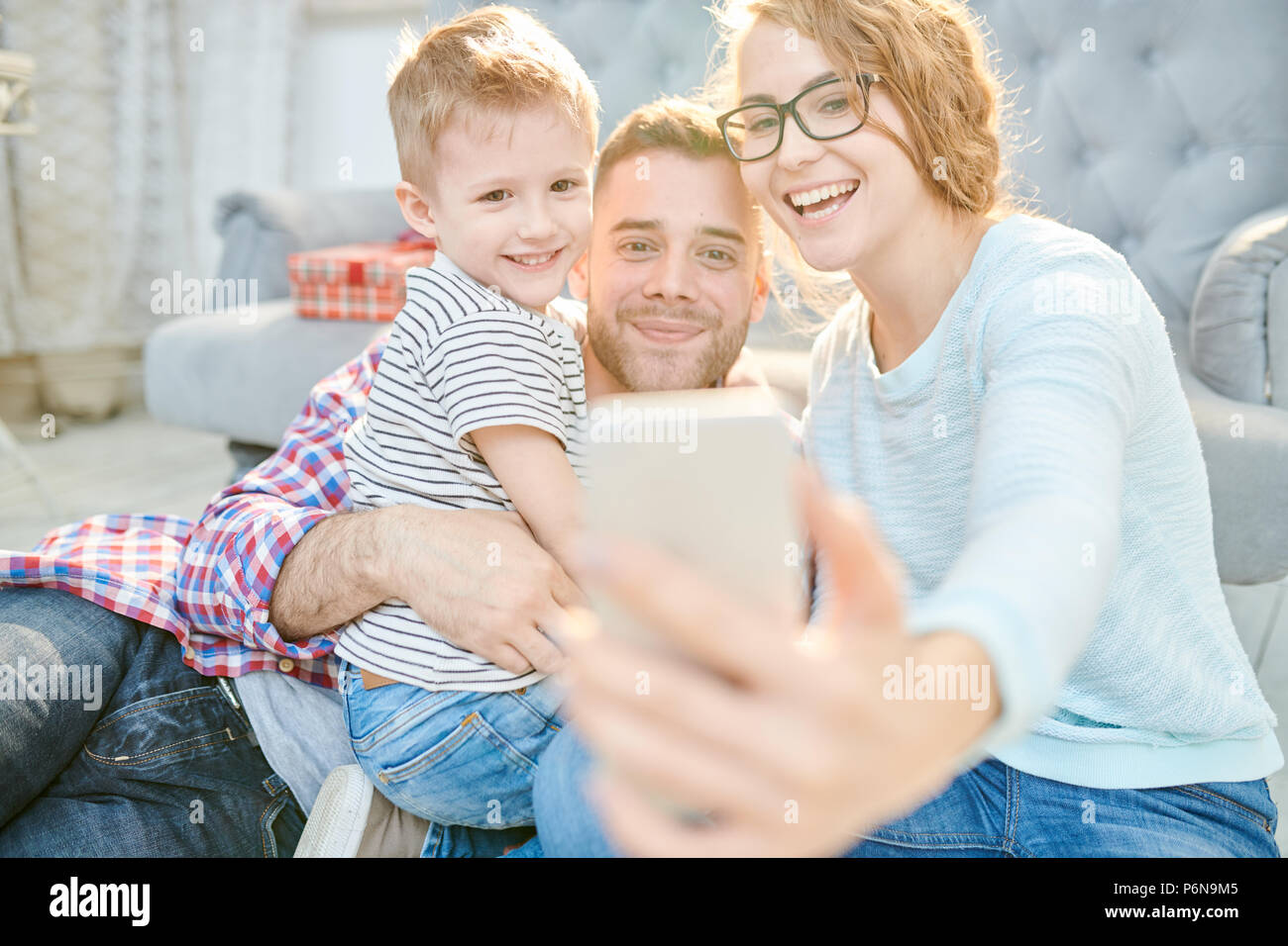 Modern Family Taking Selfie at Home Stock Photo - Alamy