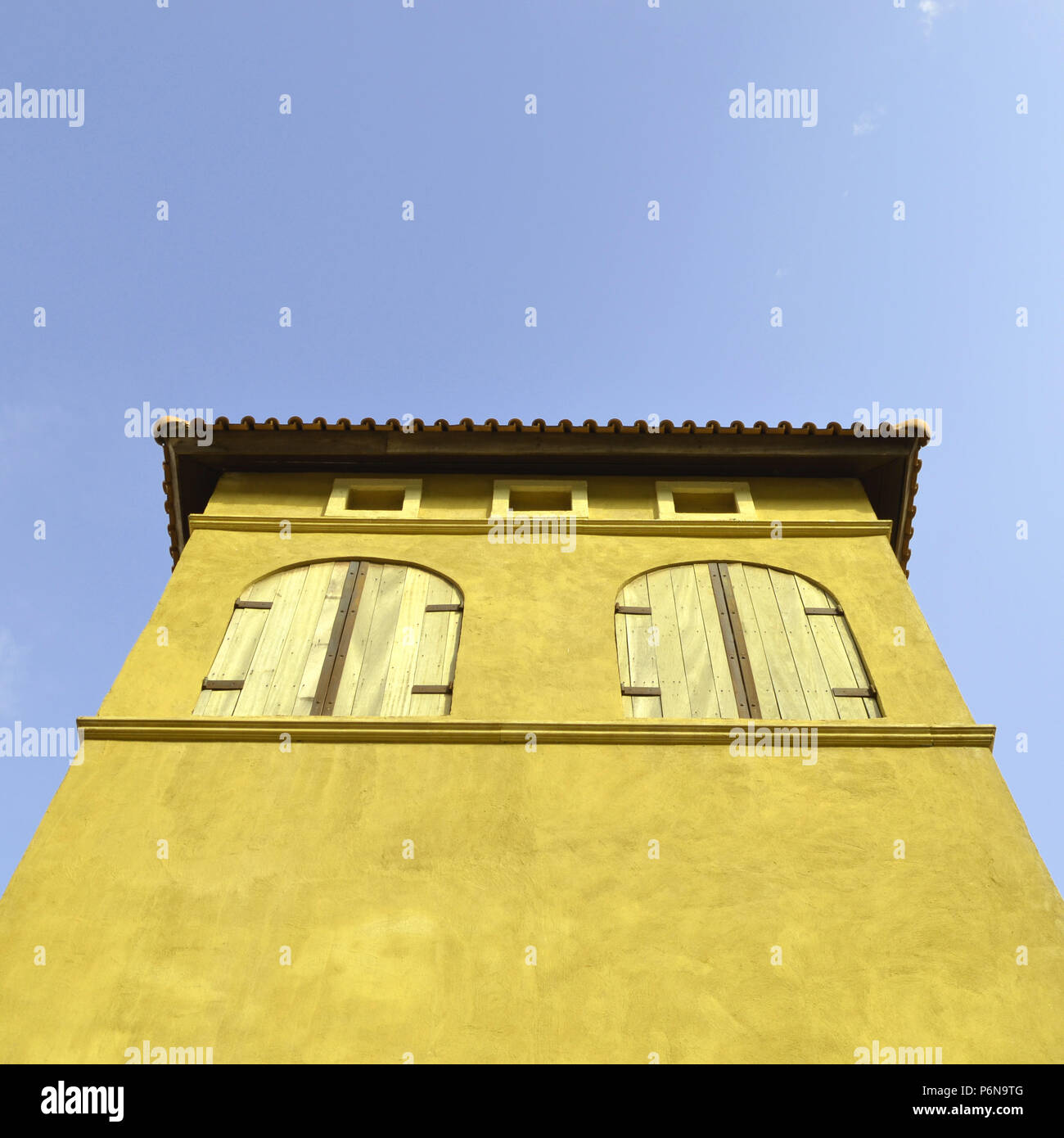 italian style building in yellow color Stock Photo - Alamy